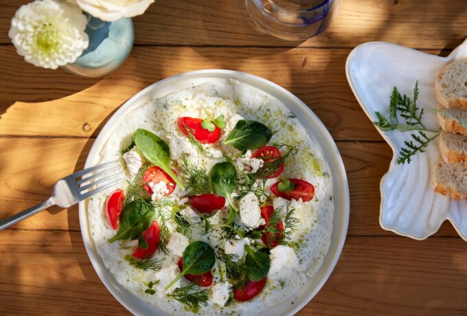 Al fresco dining with a view at the Beach Club | Ikos Porto Petro